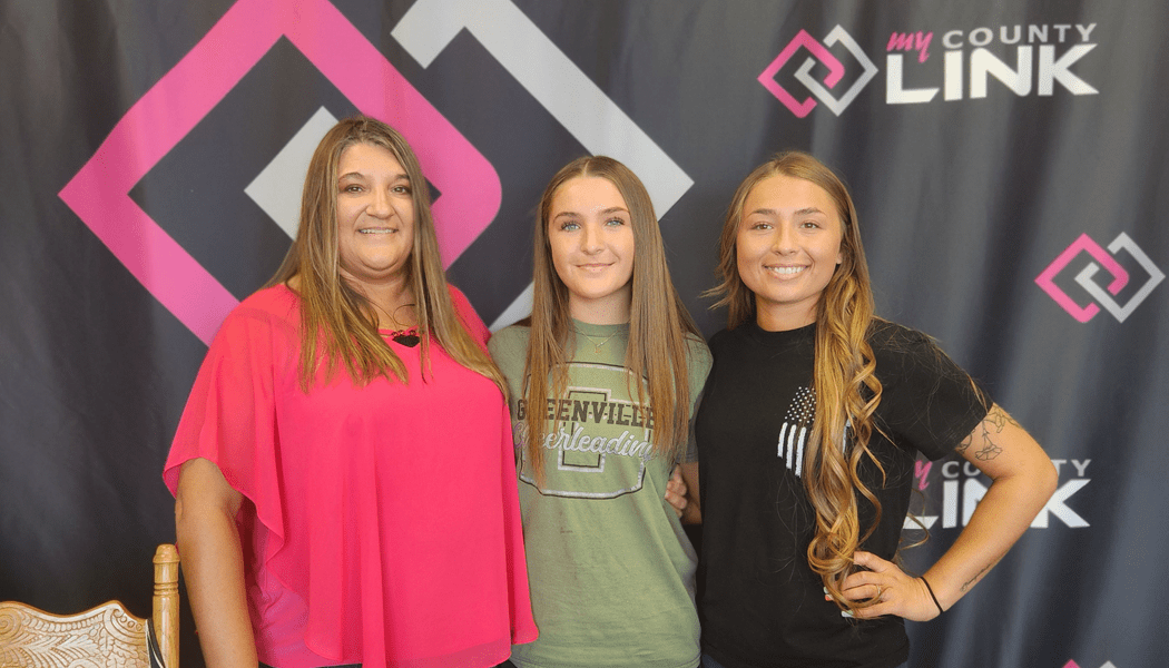 Family Runs out in Storm to Pick Up Flags | My County Link