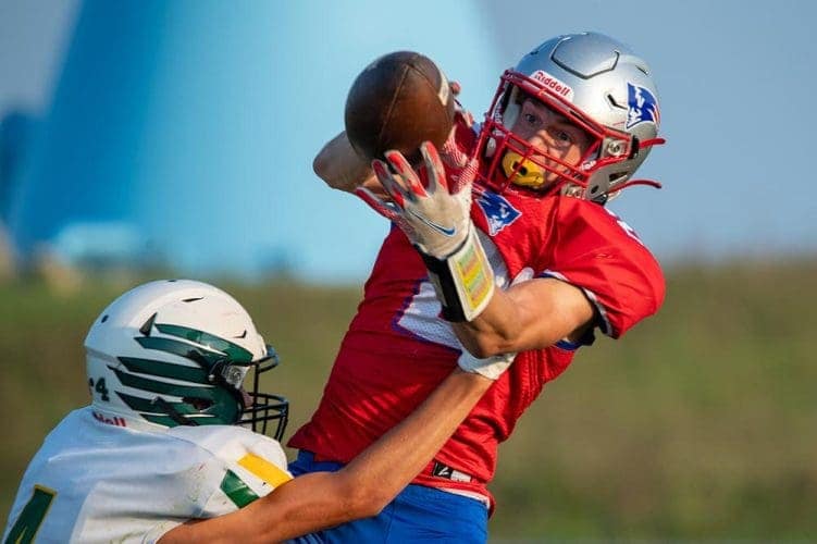 Tri-Village football takes care of business in season opener vs Troy ...